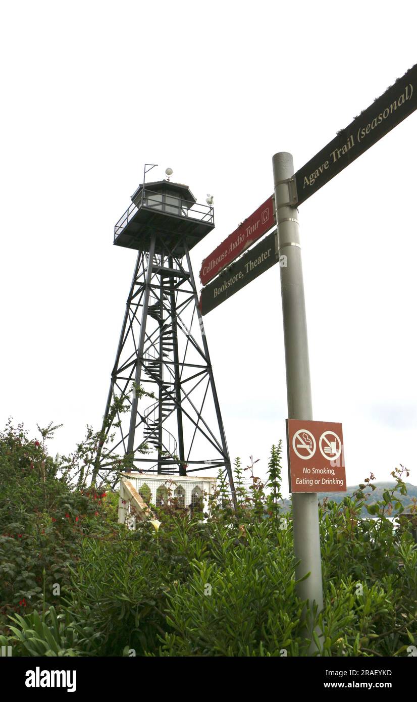 Watchtower and and direction signs on a post Alcatraz Federal ...