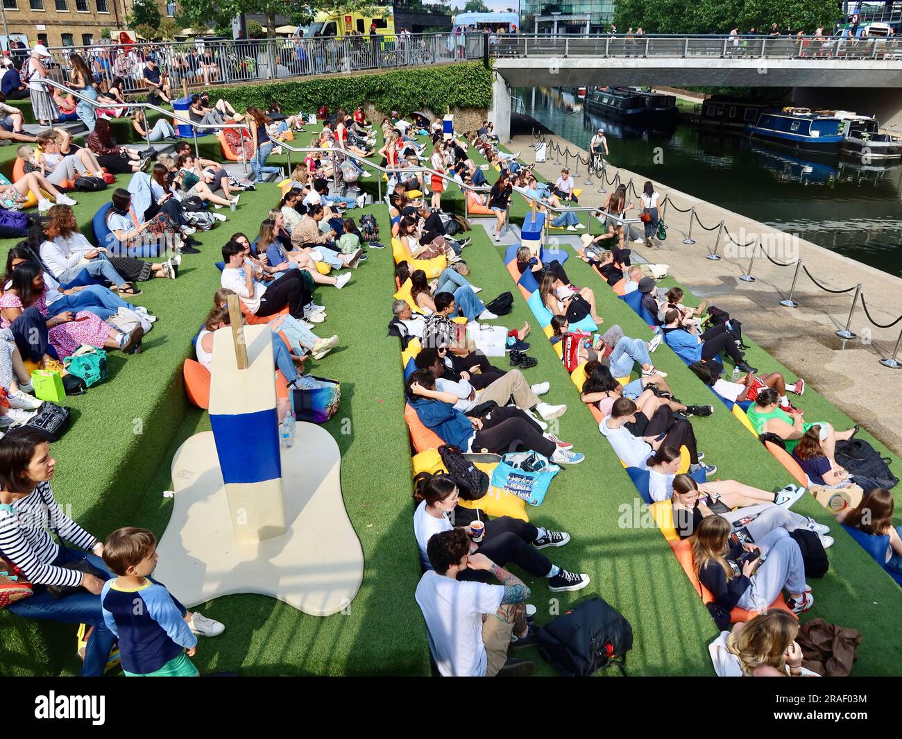 London, UK - June 2023 : Kings Cross. Everyman green steps alongside ...