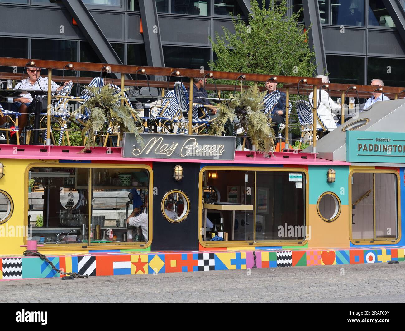 London, UK - June 2023 : Bright summer afternoon at Paddington. Cafes ...