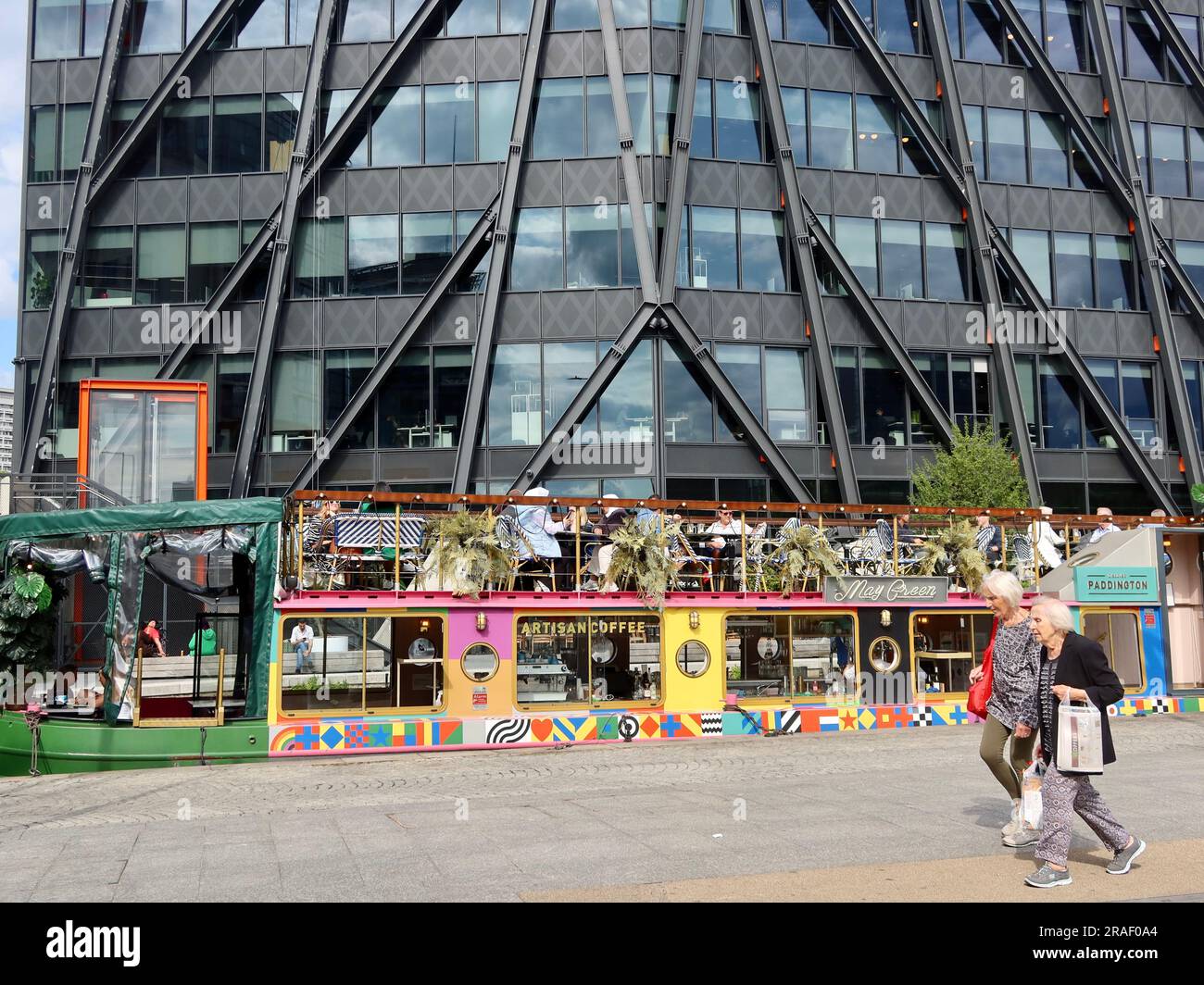 London, UK - June 2023 : Bright summer afternoon at Paddington. Cafes ...