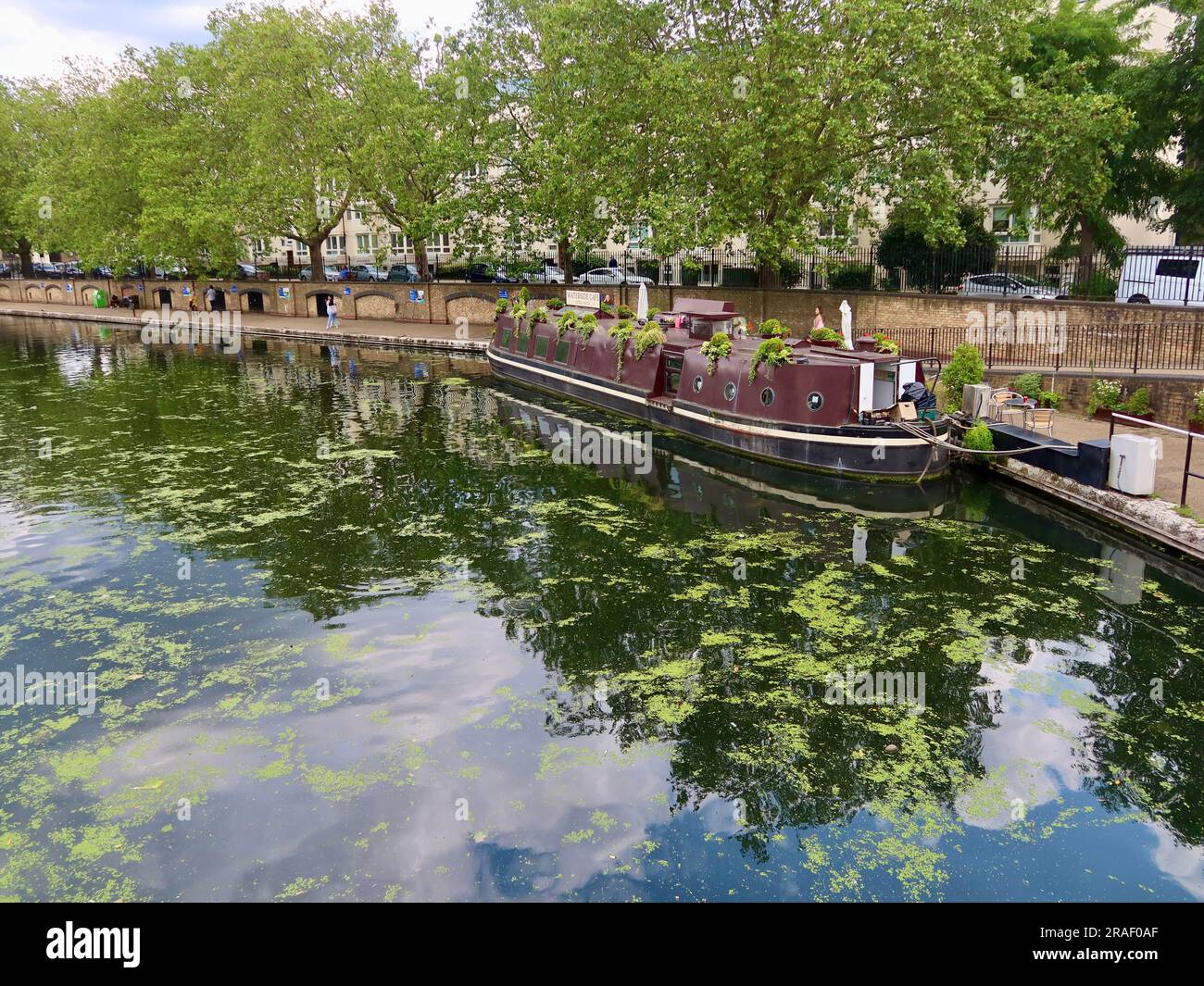 London, UK - June 2023 : Waterbus arrives at Little Venice. Coffee shop ...