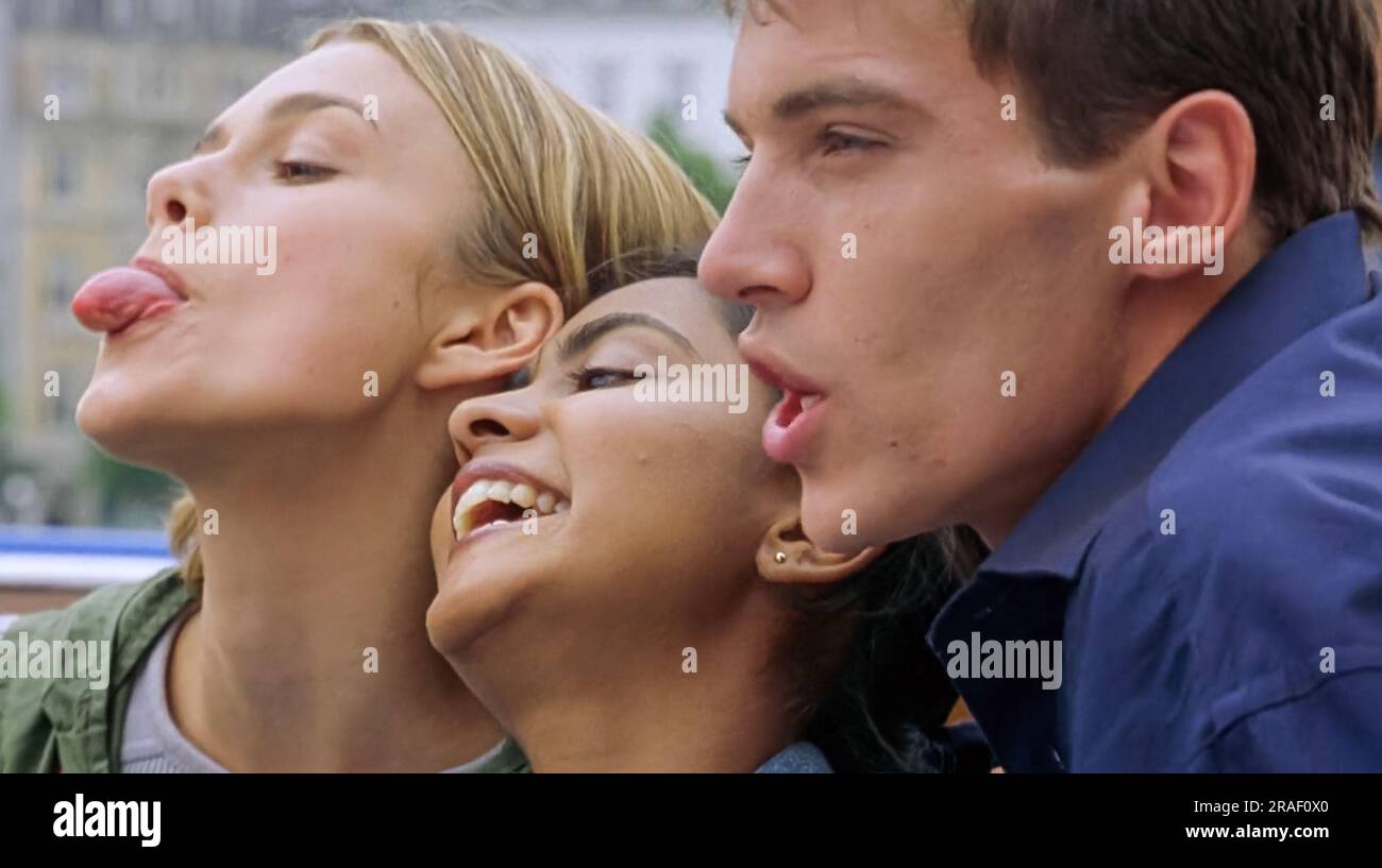 UK. Jonathan Rhys Meyers, Keira Knightley and Parminder Nagra in a scene from the (C)Helkon SK ...