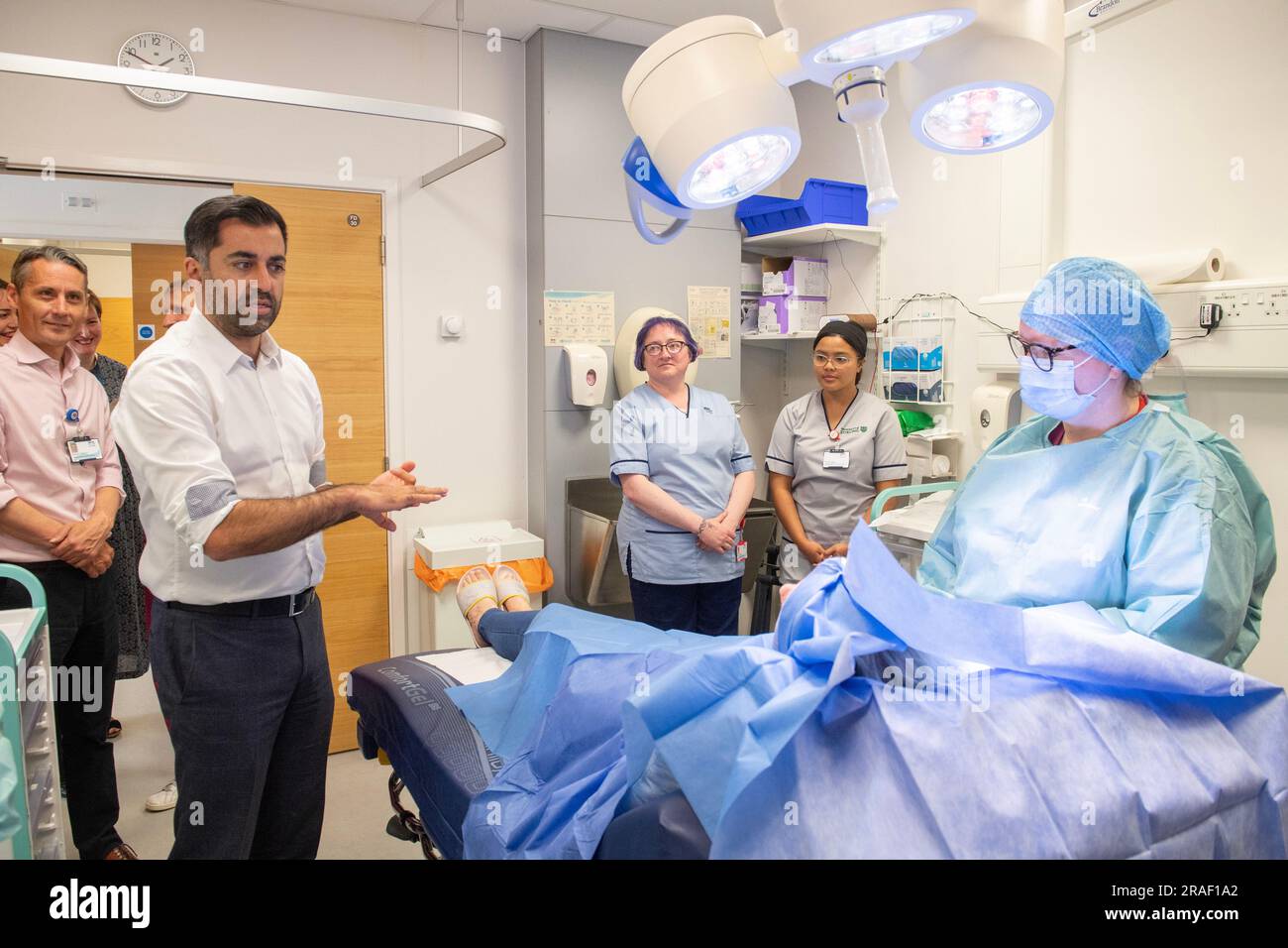 First Minister Humza Yousaf meets patient Catherine Esplin during a ...