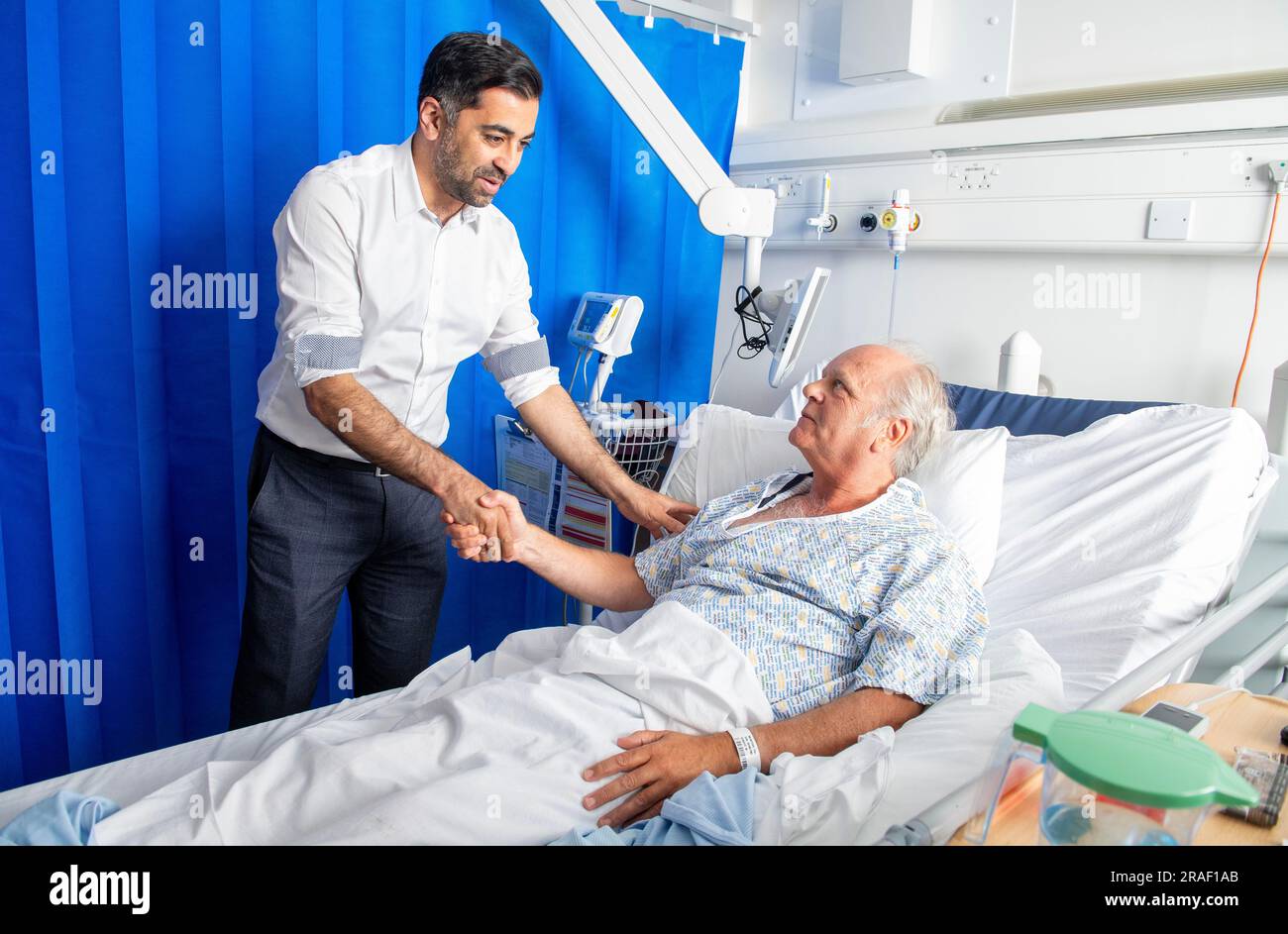 First Minister Humza Yousaf meets patient Paul MacIntosh during a visit ...