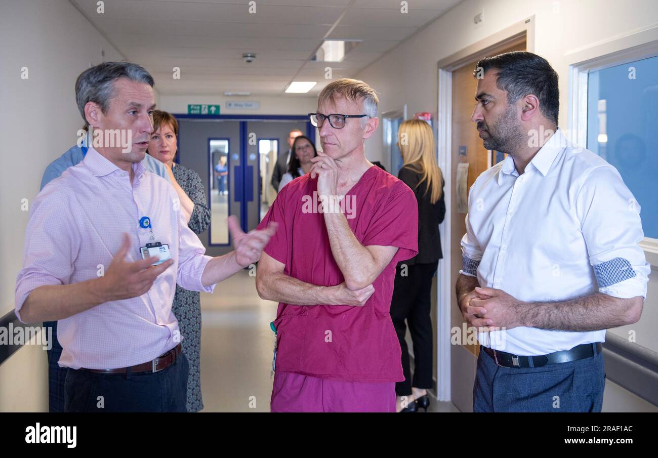 First Minister Humza Yousaf (right) meets Consultant Anaesthetist Ewan ...