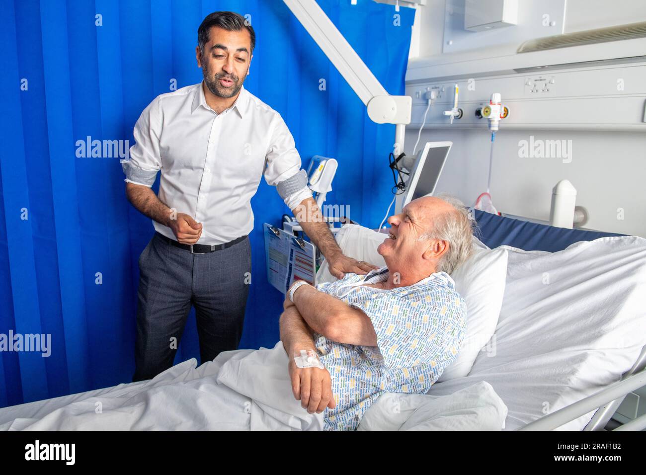 First Minister Humza Yousaf meets patient Paul MacIntosh during a visit ...