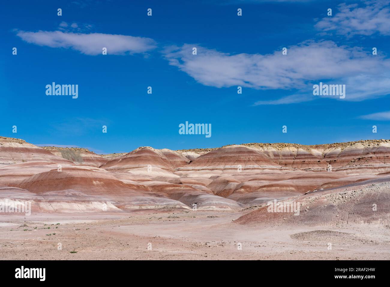 Colorful striped bentonite clay hills of the Morrison Formation in the ...