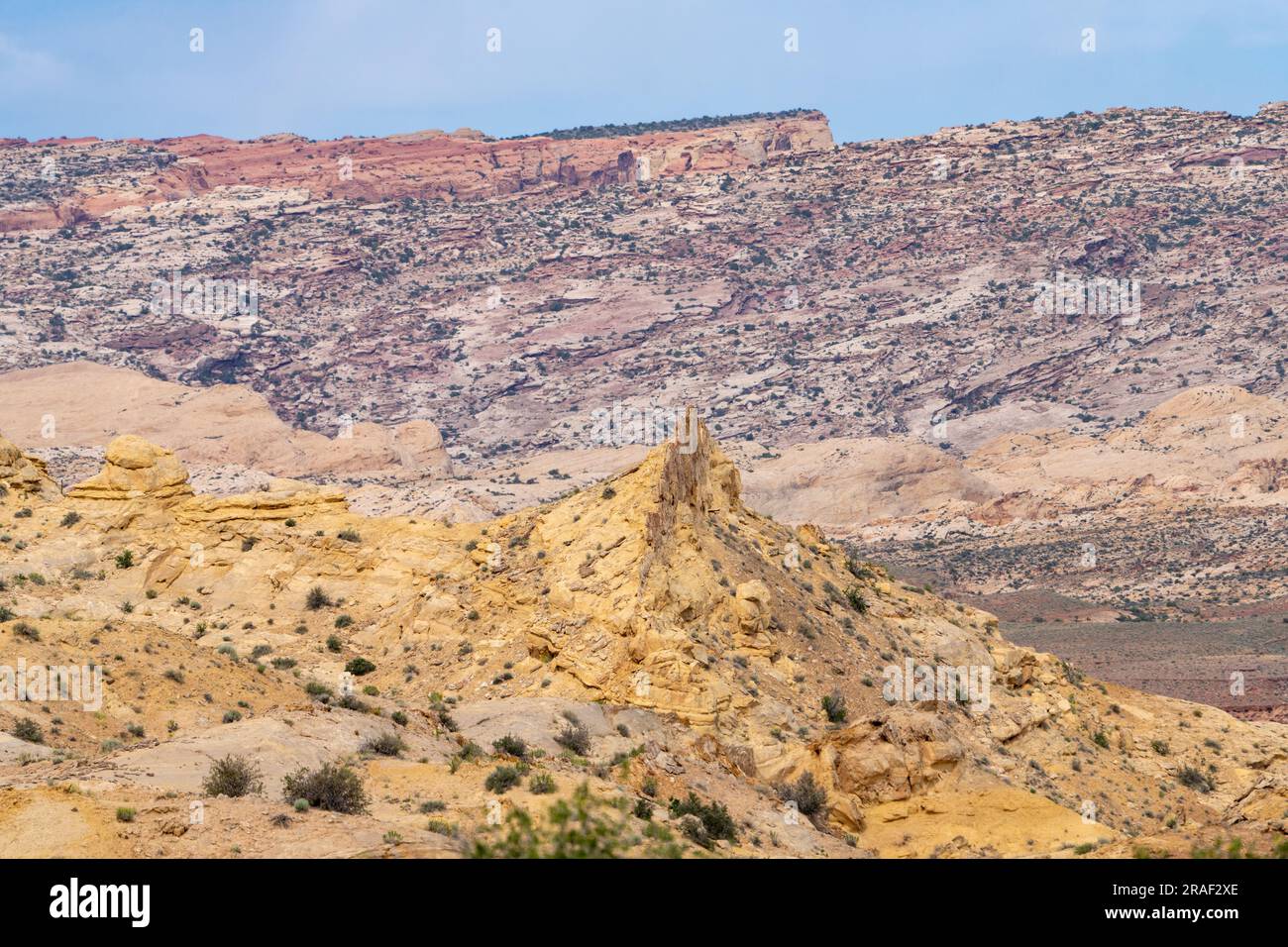 A sandstone rock formation with a thin fin resembling a stegasaurus ...