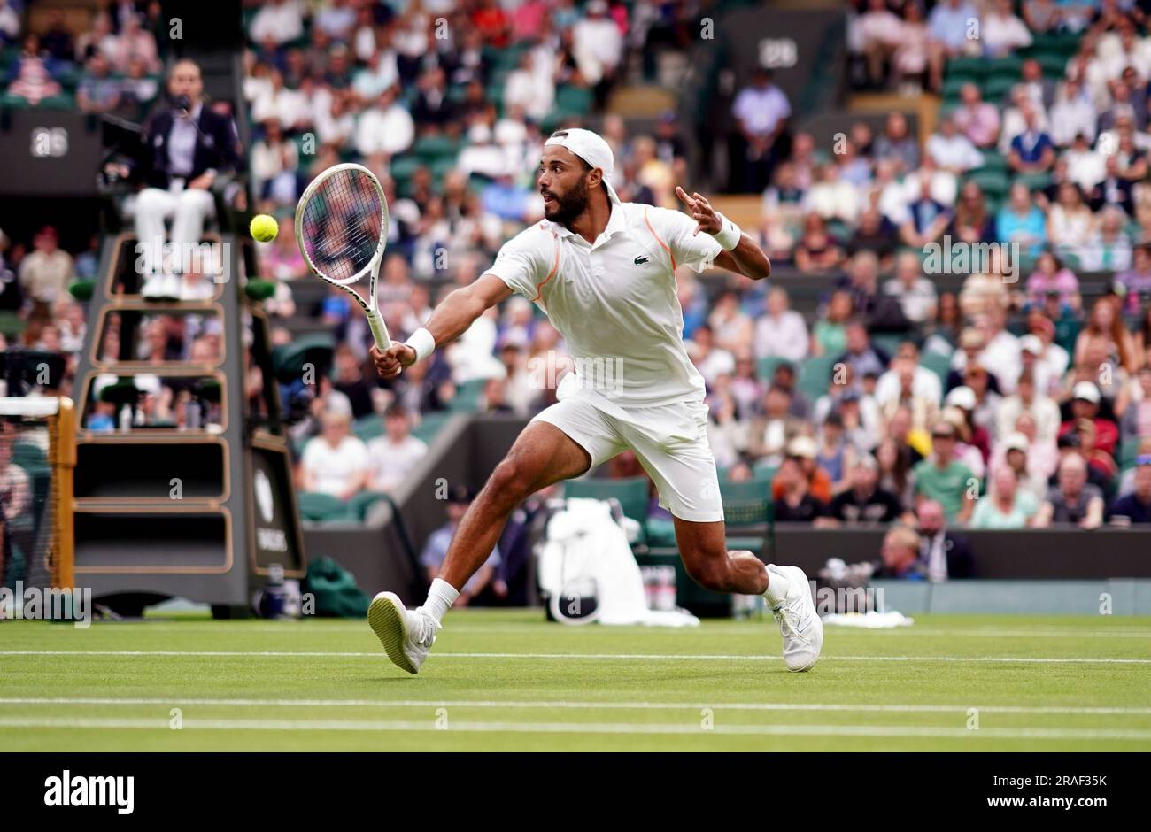 Laurent Lokoli in action against Casper Ruud (not pictured) on day one ...