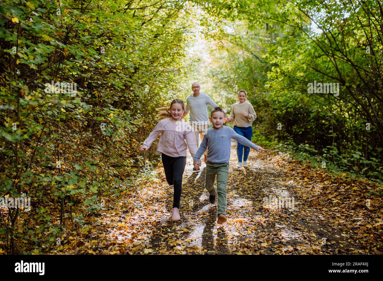 Happy kids siblings run hi-res stock photography and images - Alamy