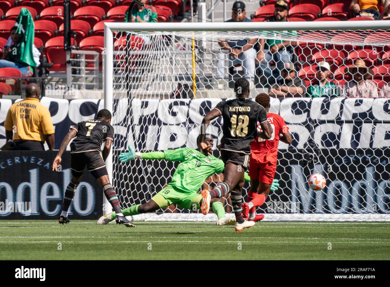 Jamaica forward Leon Bailey (7) scores a goal past Saint Kitts and ...