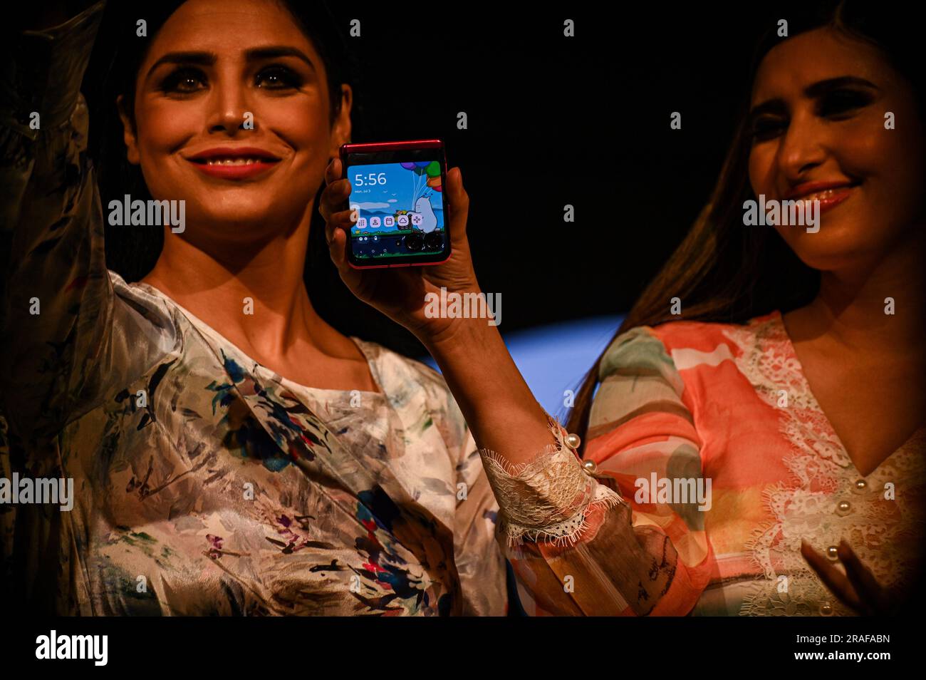 New Delhi, Delhi, India. 3rd July, 2023. Models pose with Motorola Razr ...
