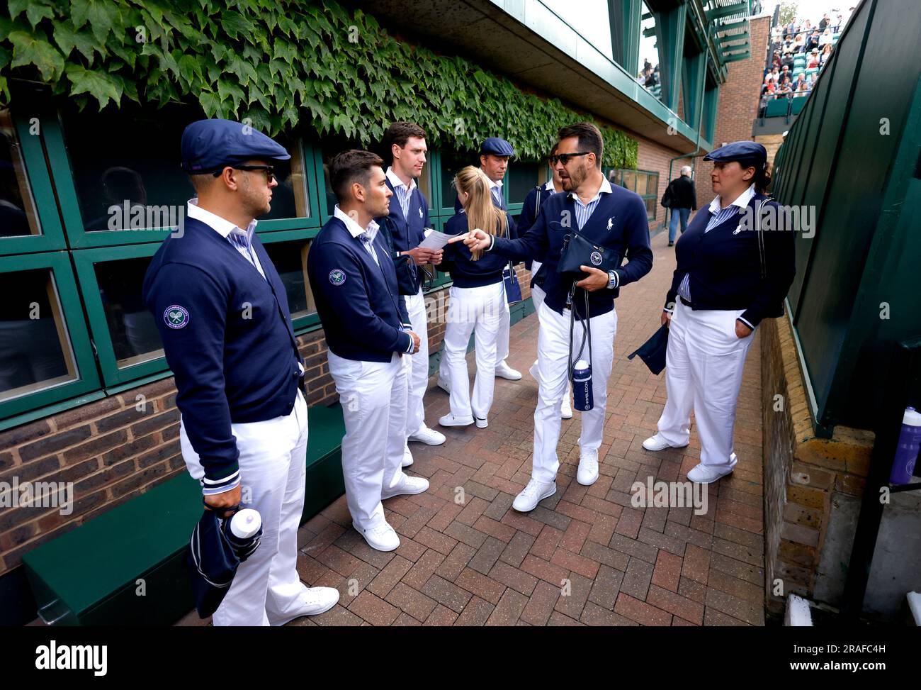 Match officials wait to walk onto court on day one of the 2023 ...