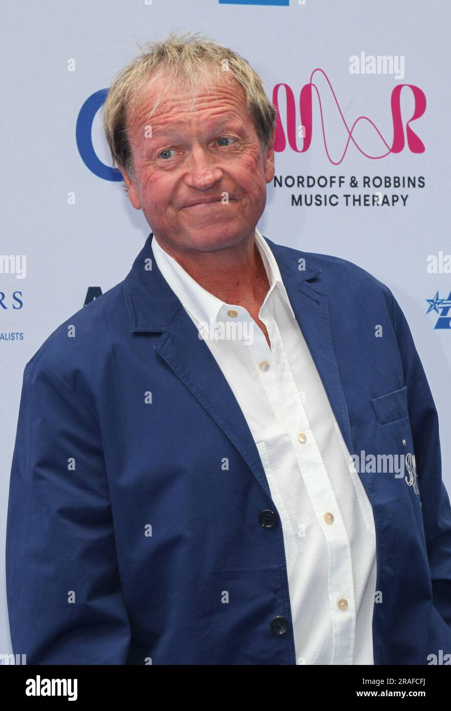 London.UK. Mark King at the Nordoff and Robbins O2 Silver Clef Awards ...