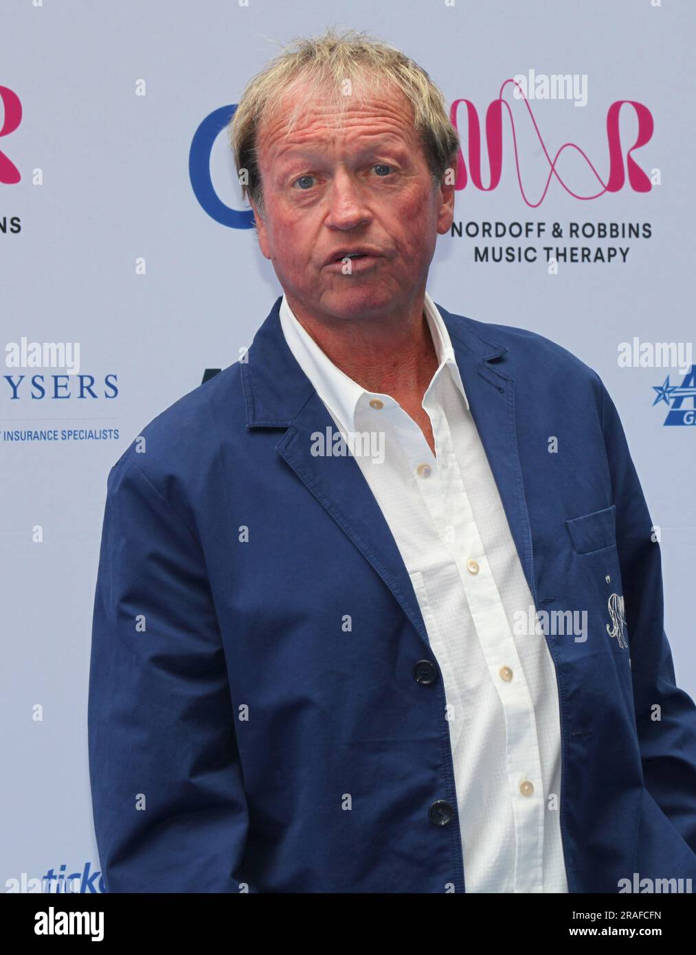 London.UK. Mark King at the Nordoff and Robbins O2 Silver Clef Awards ...