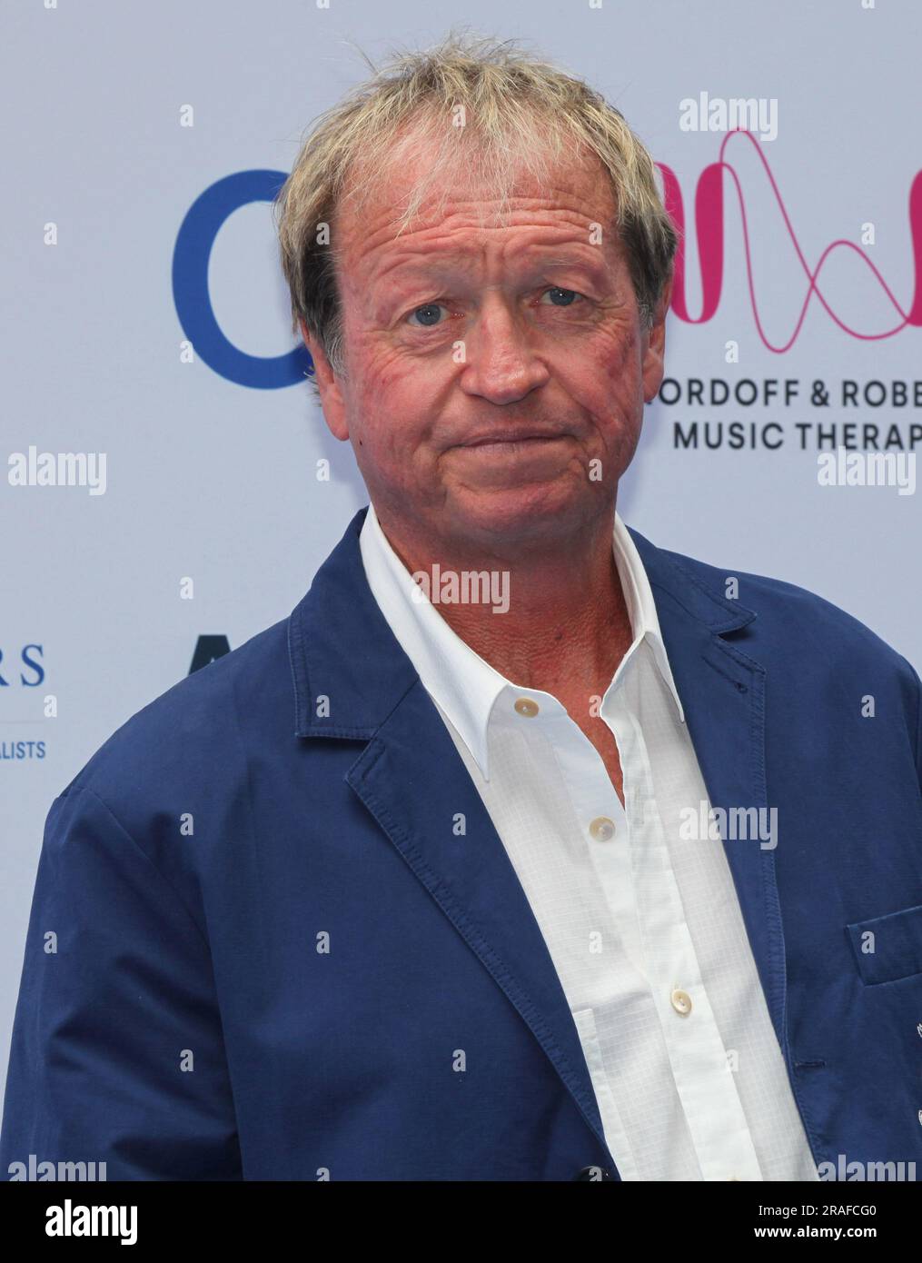 London.UK. Mark King at the Nordoff and Robbins O2 Silver Clef Awards ...