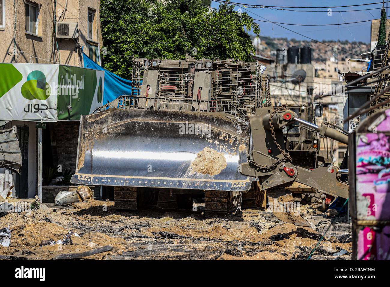 Jenin, Palestine. 03rd July, 2023. An Israeli military bulldozer seen ...