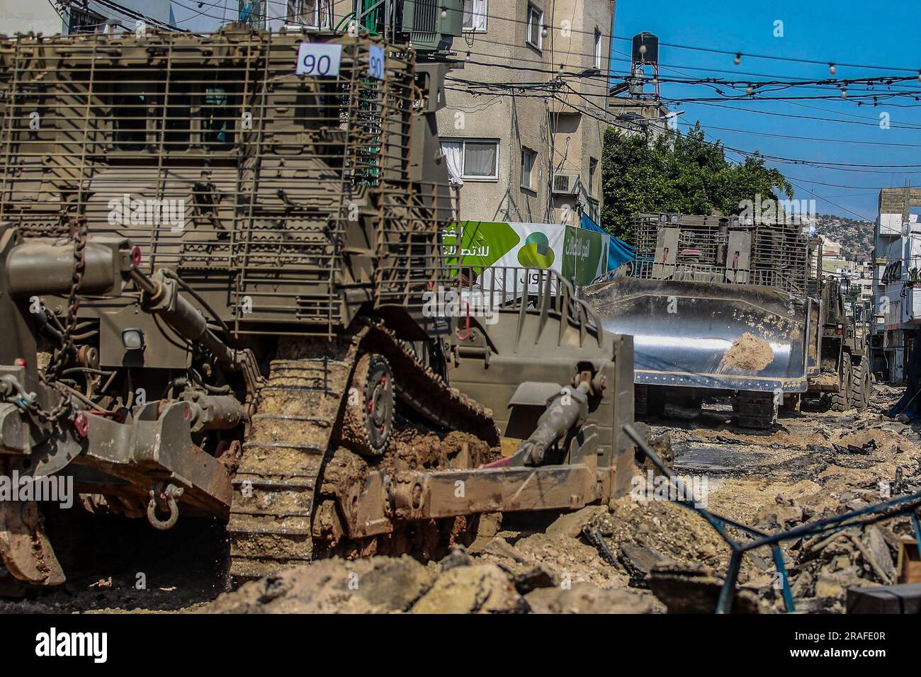 Jenin, Palestine. 02nd July, 2023. Israeli military bulldozers seen ...