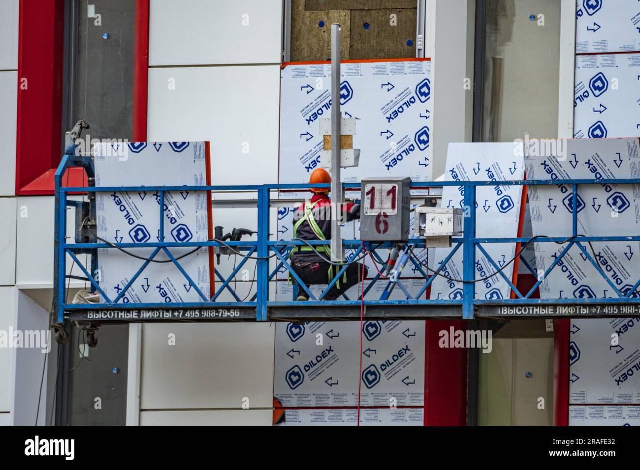 Russia, Moscow. Construction of residential buildings. Cladding of the ...