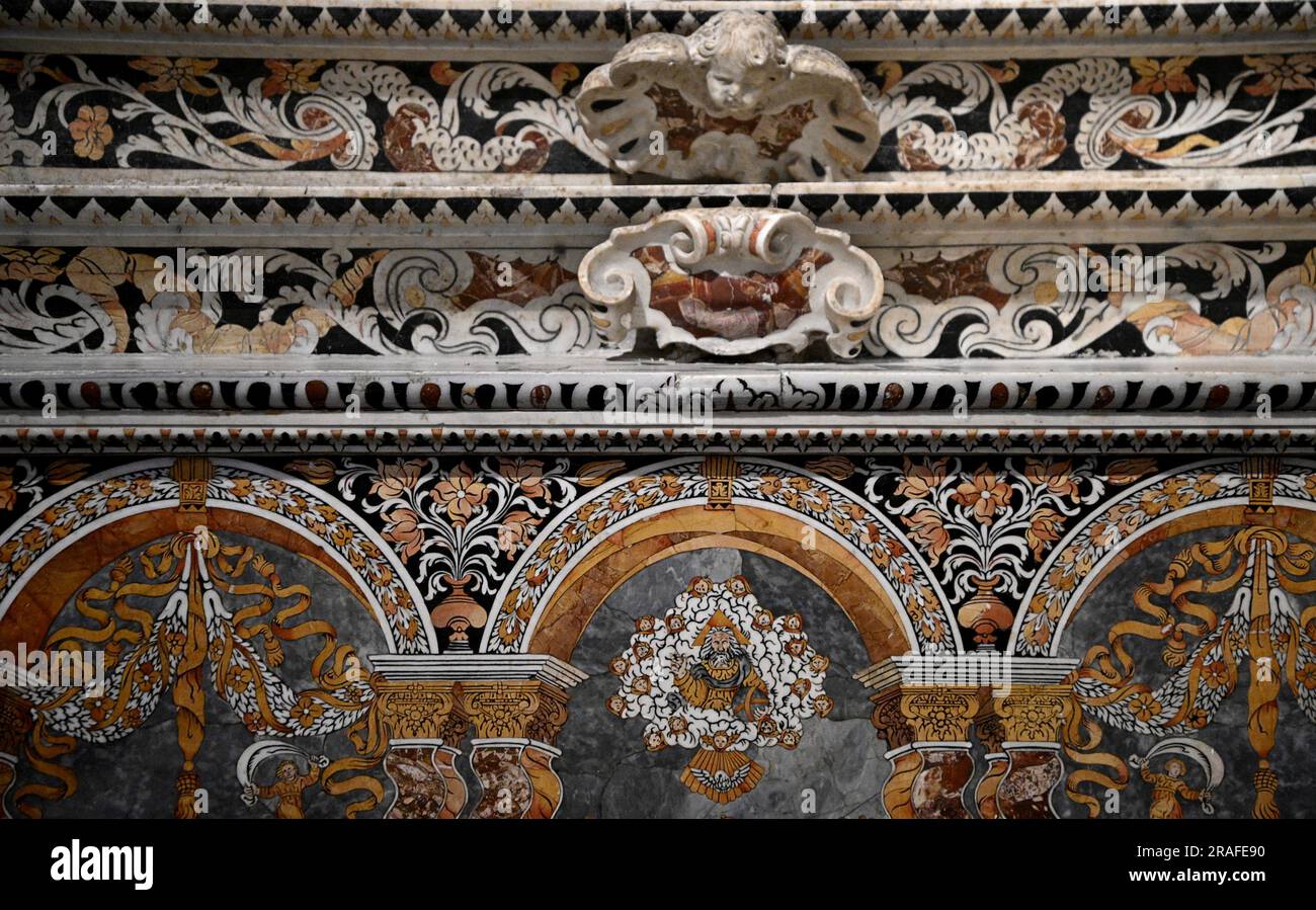 Marble sculpted mosaic in the interior of the Baroque style Cappella ...