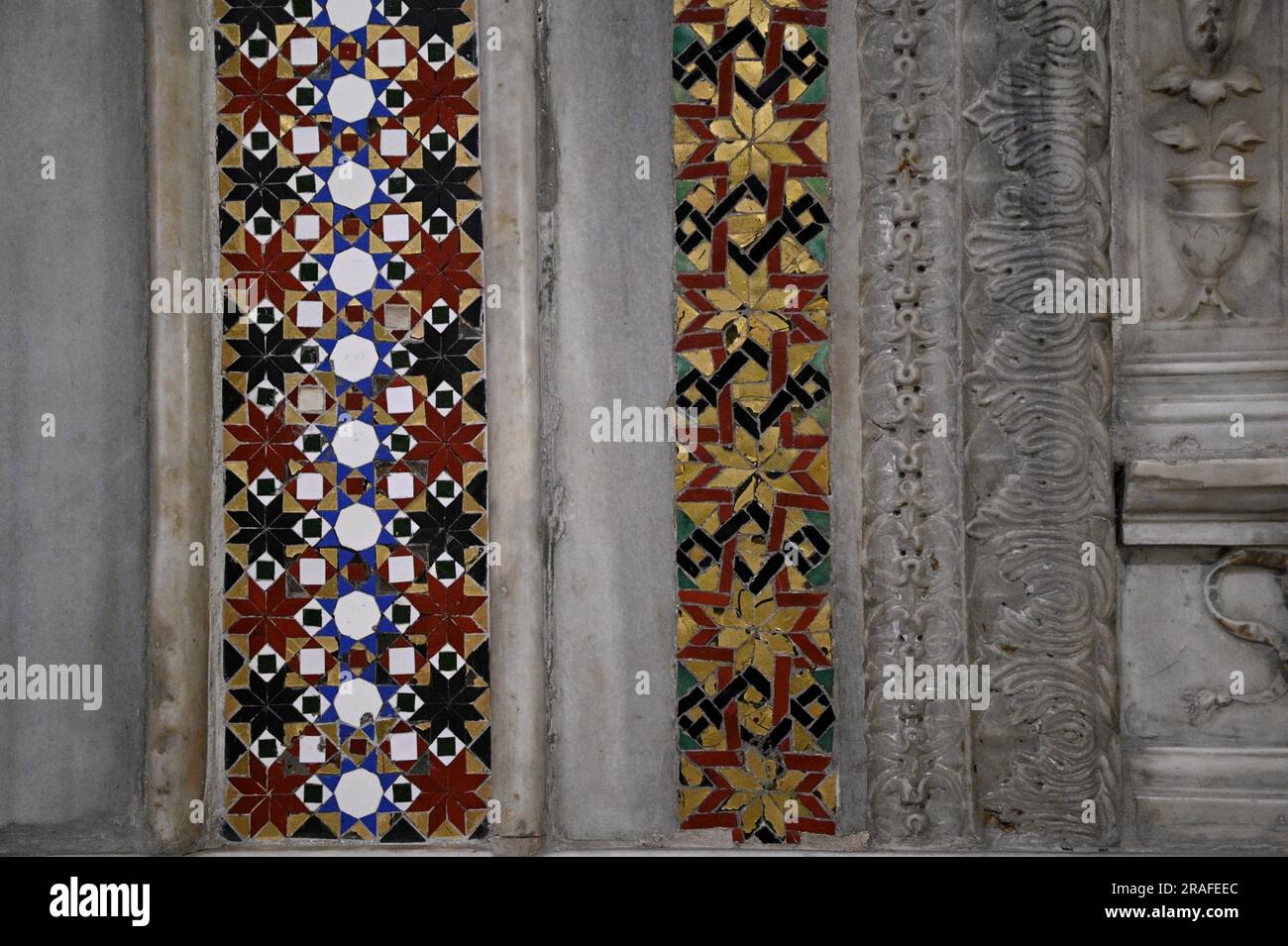 Column richly inlaid with colored and golden Byzantine tiles and ...