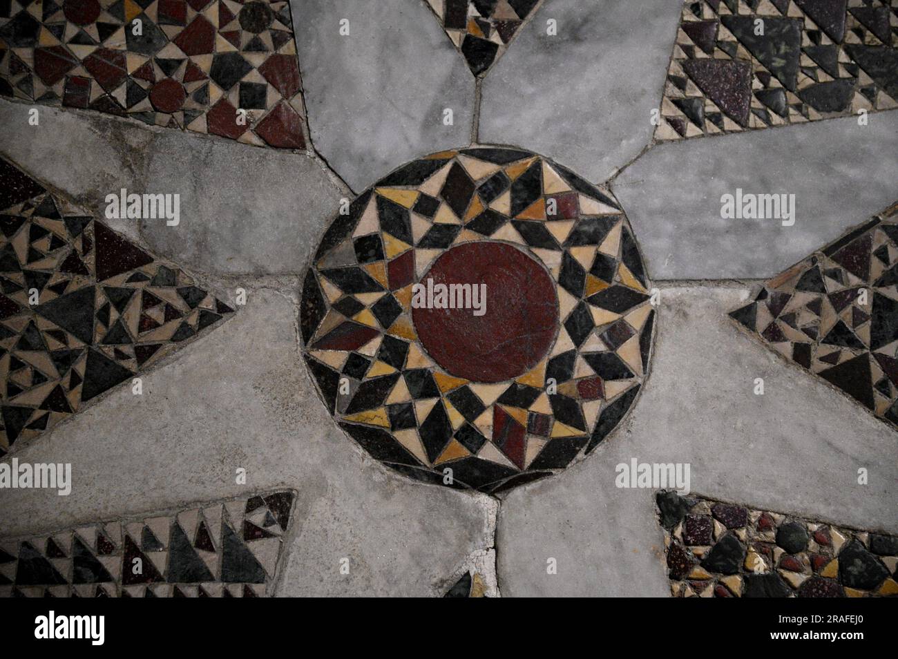 Medieval Cosmatesque mosaic floor in the interior of the Baroque style ...