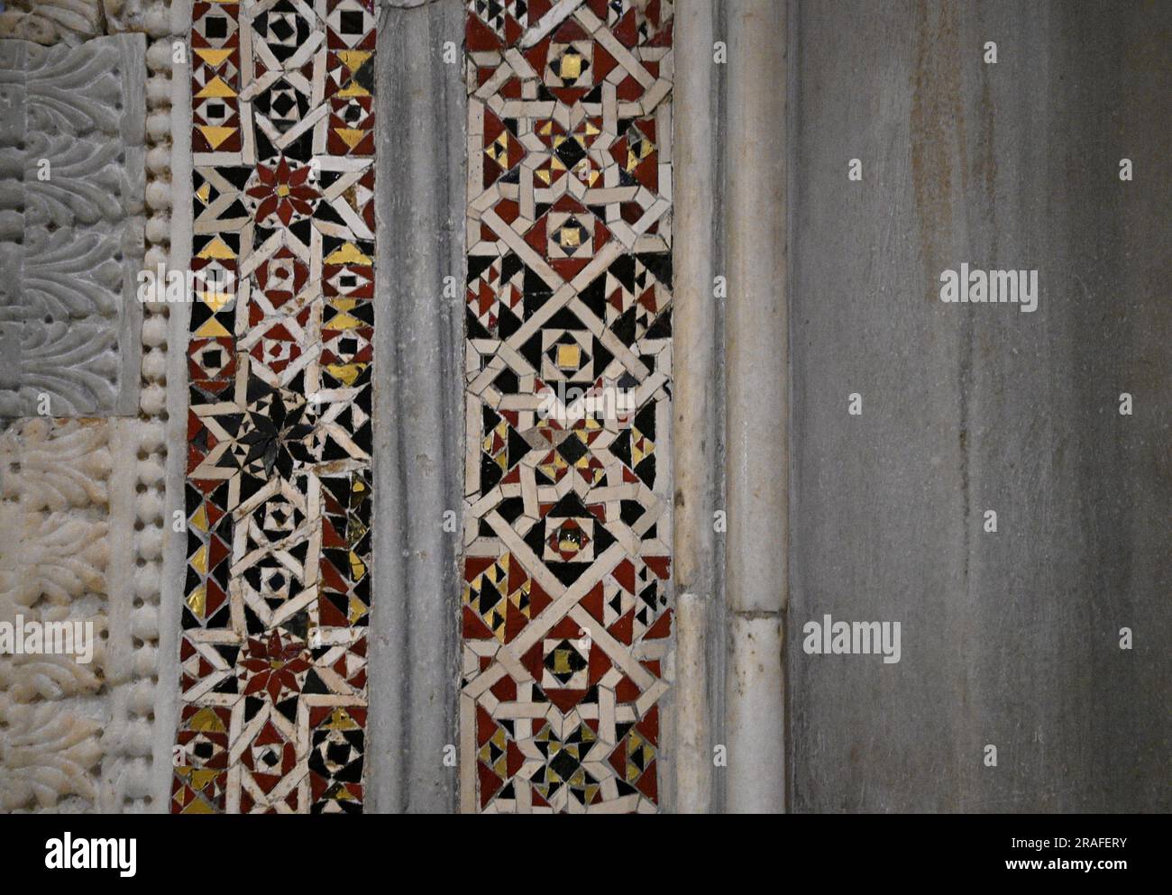 Column richly inlaid with colored and golden Byzantine tiles and ...