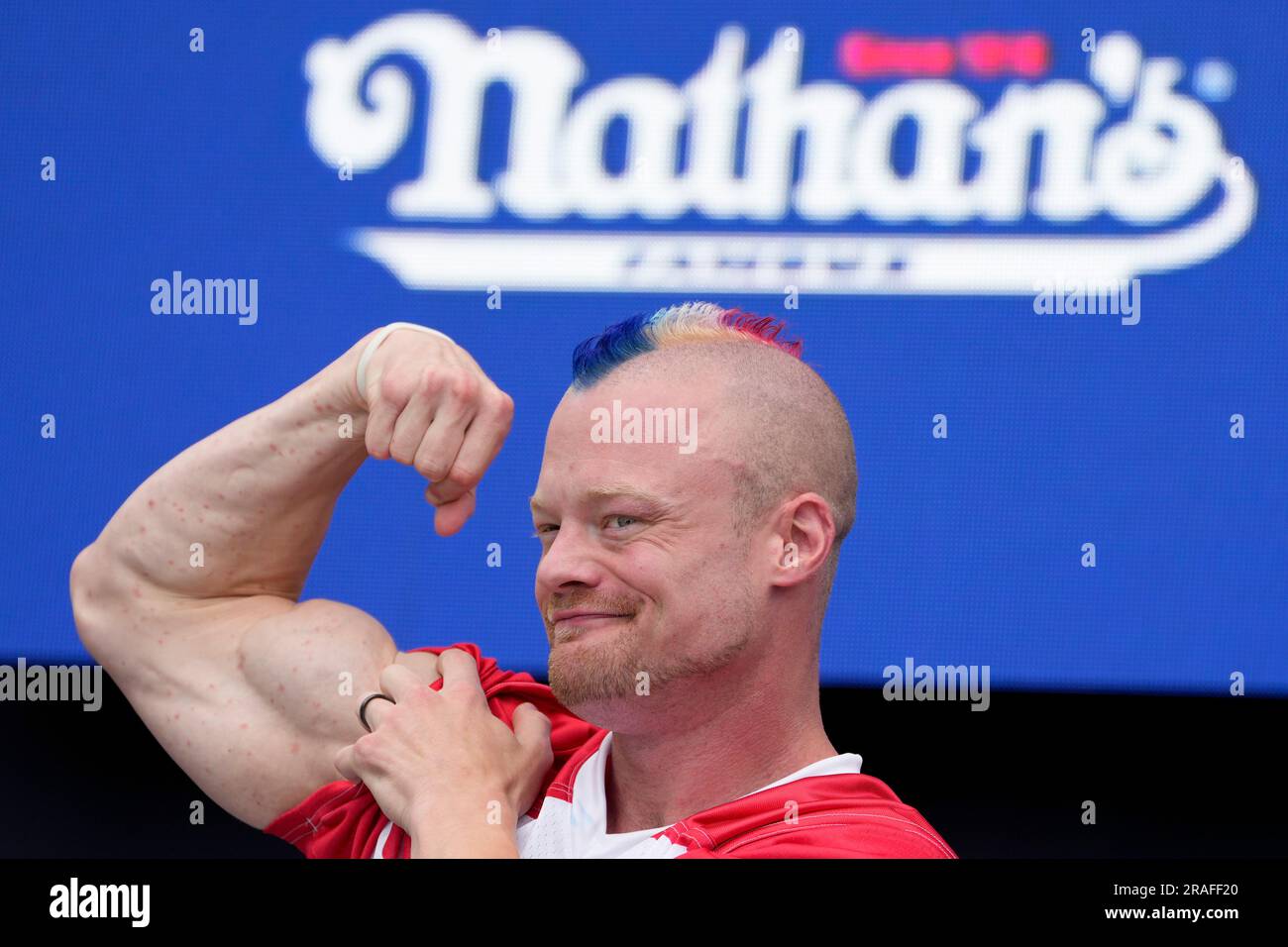 Competitive eater Nick Wehry is introduced during a weigh-in ceremony ...
