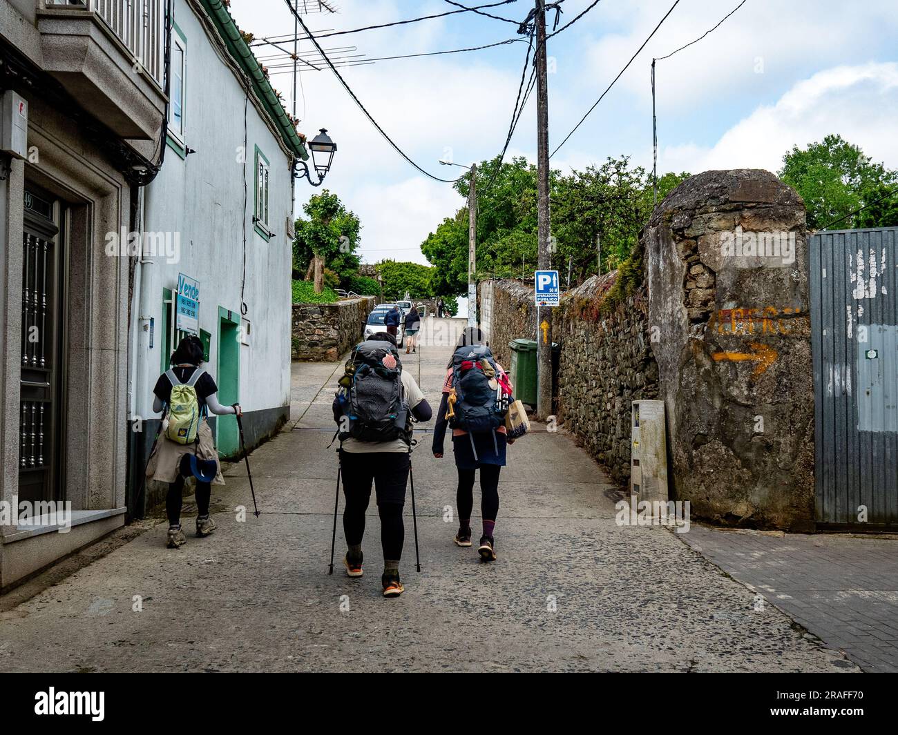 Melide, Spain. 31st May, 2023. A group of pilgrims seen following the ...