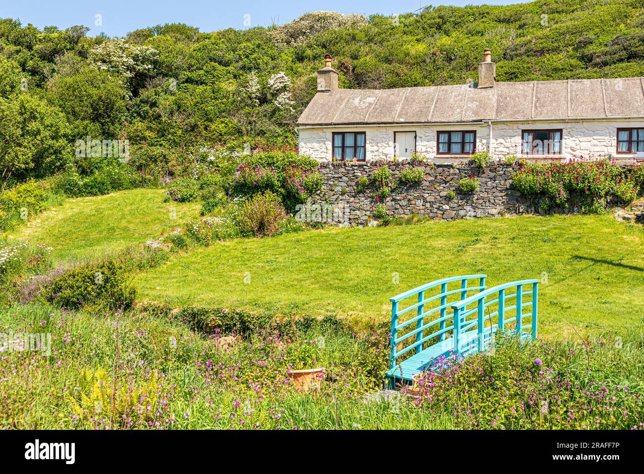 A small cottage beside a stream on the Pembrokeshire Coast Path ...