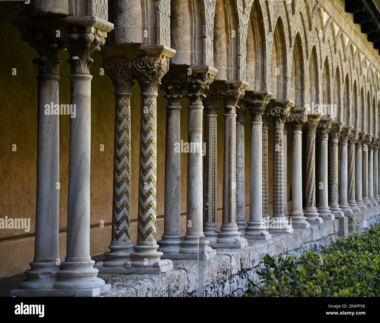 Arab Norman style arches and columns with Romanesque style carved ...