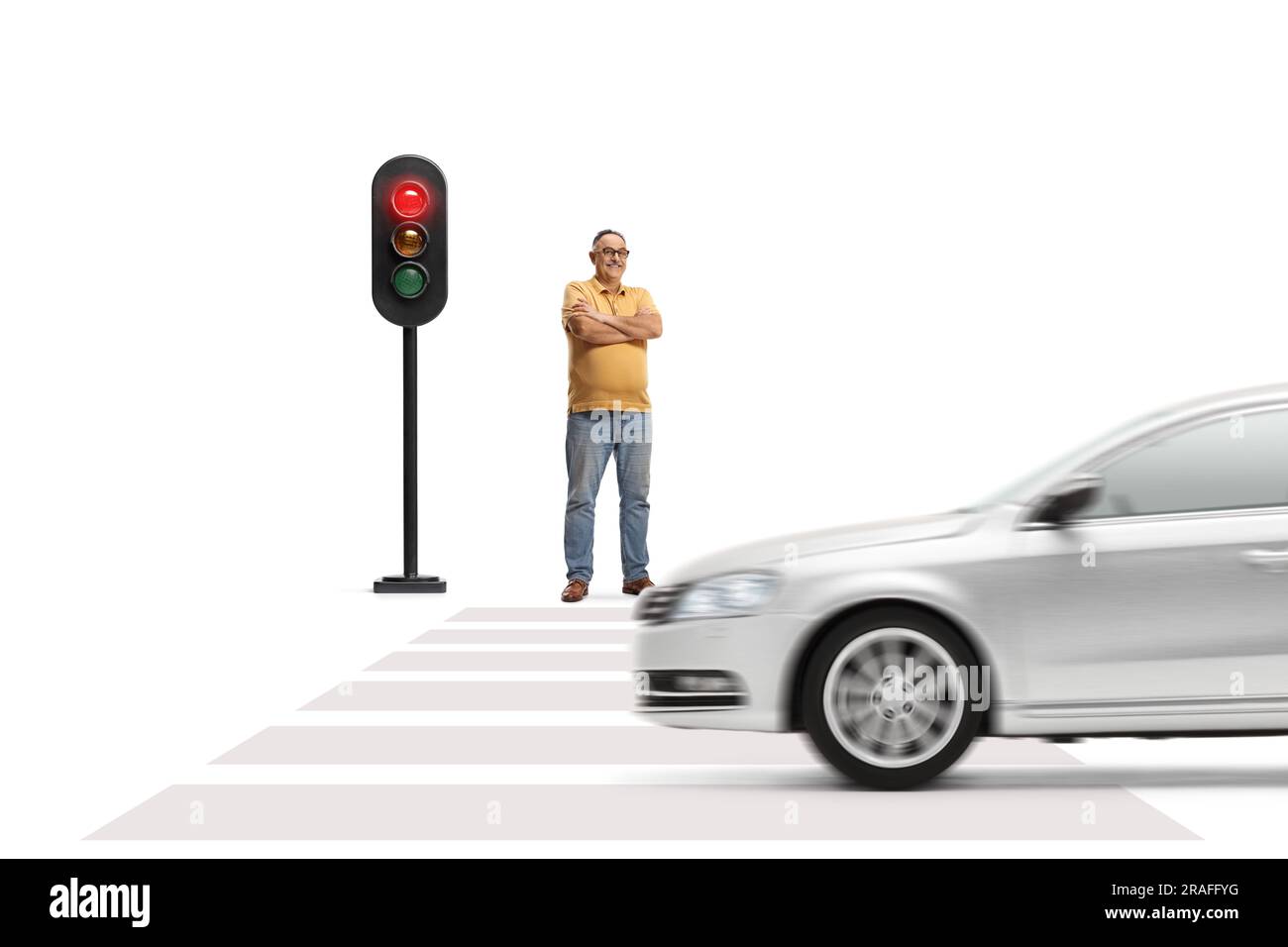Full length portrait of a mature man waiting to cross a street at ...