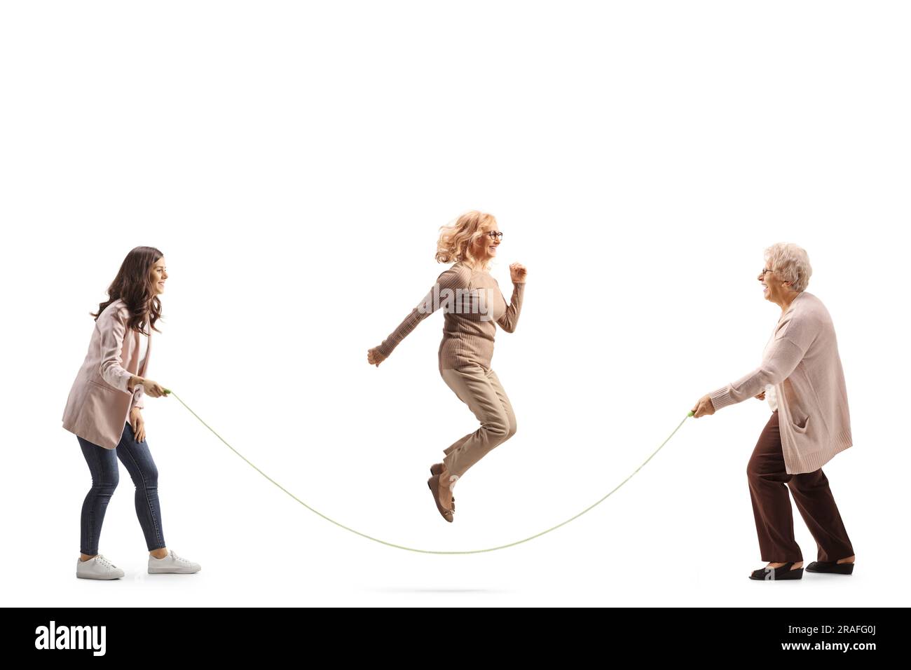 Grandmother, mother and daughter playing a skipping rope isolated on ...