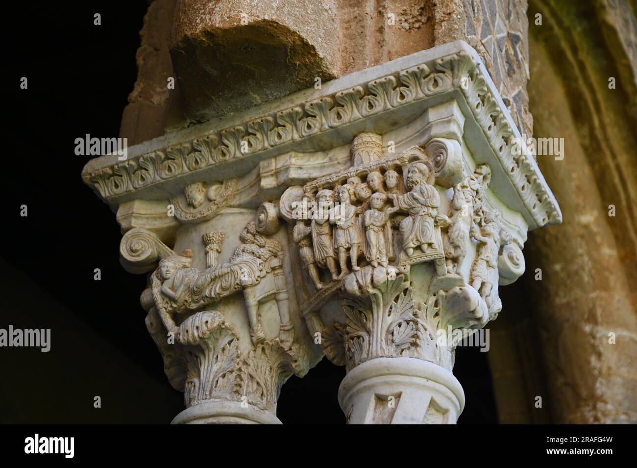 Antique Romanesque style column capital depicting scenes from the Old ...