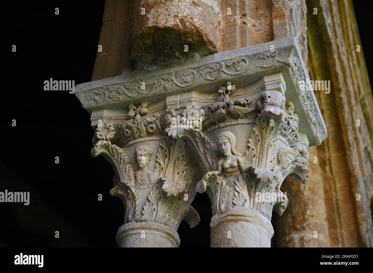 Antique Romanesque style column capital depicting scenes from the Old ...