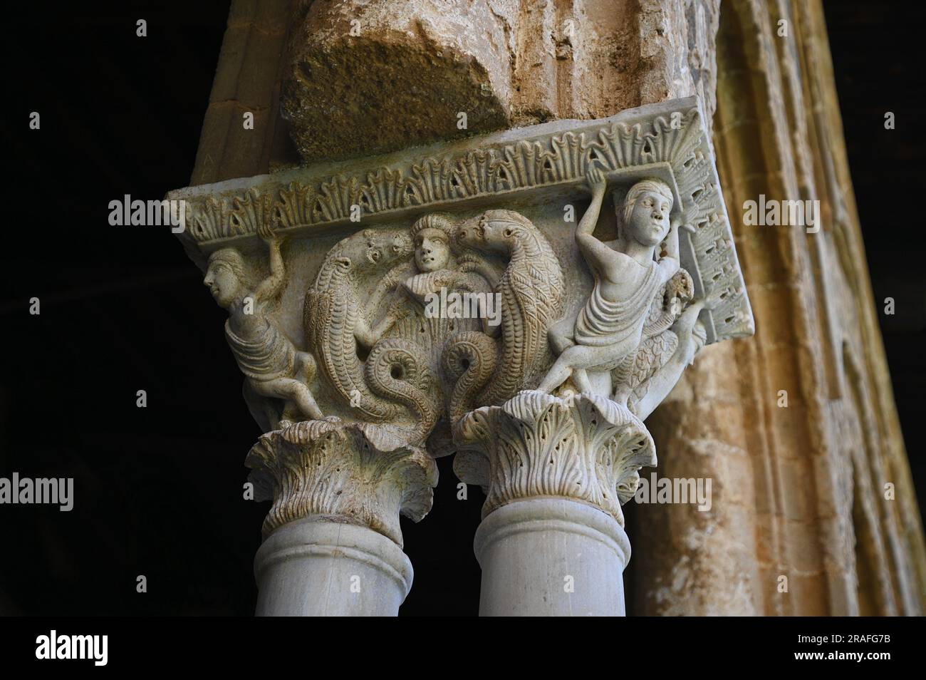 Antique Romanesque style column capital depicting scenes from the Old ...