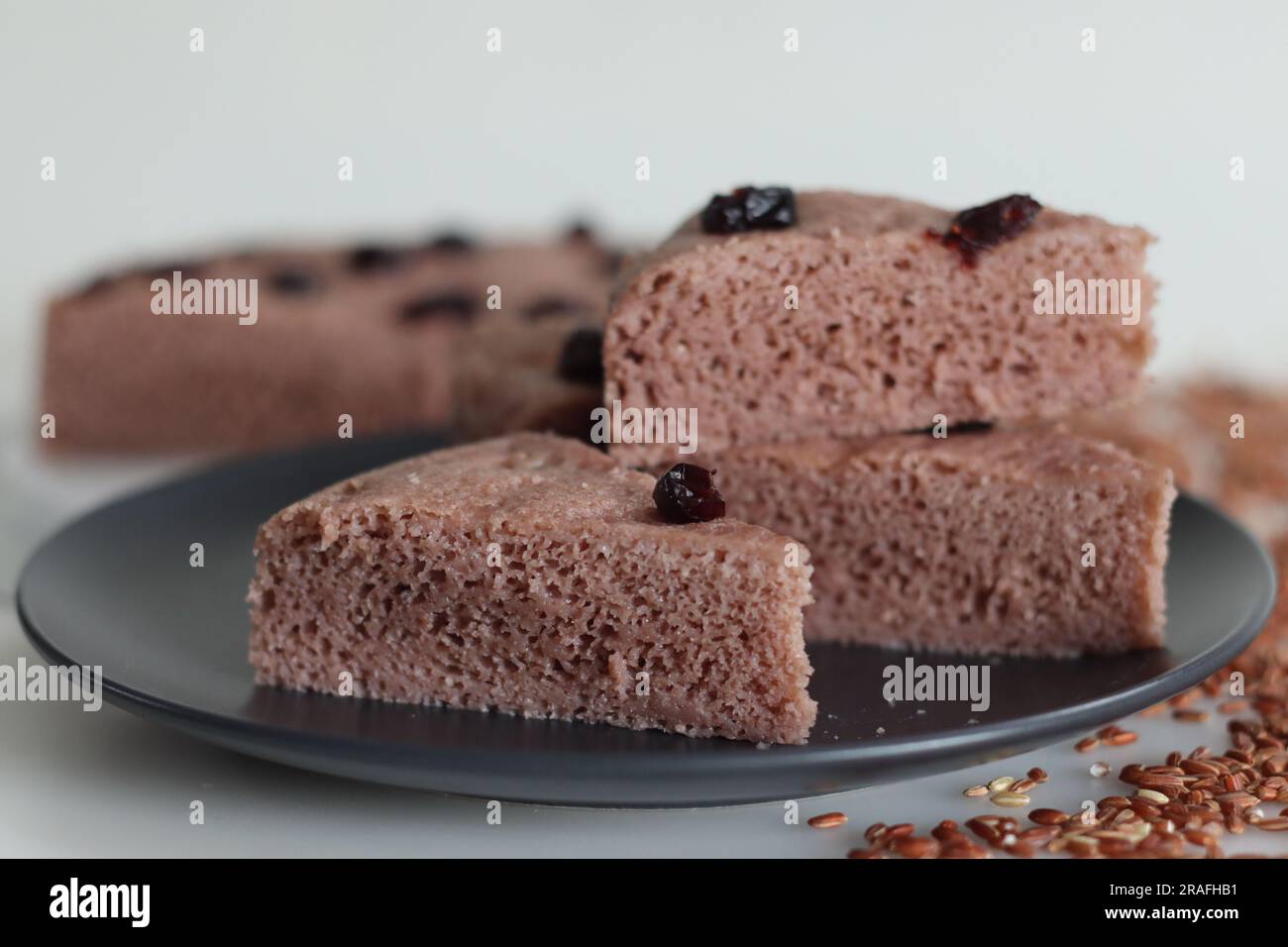 Slices of Navara rice vattayappam. Steamed rice cake made with a ...