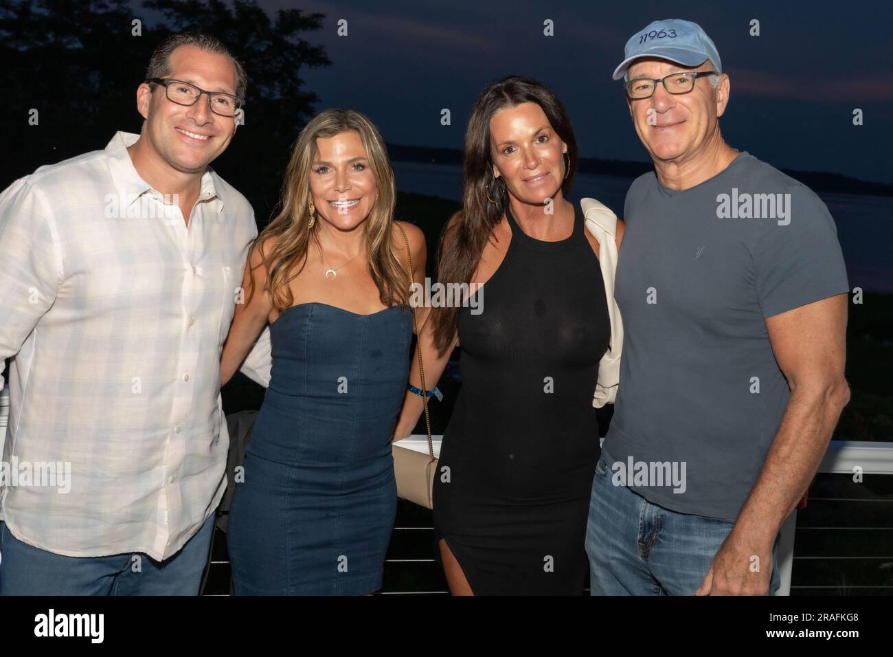 Guest, Dana Wood, Connie Lippert and Keith Lippert attend the Patriotic ...