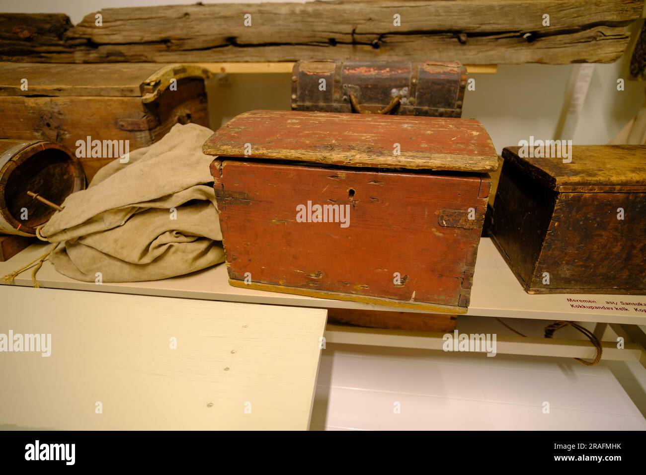 An old chest for storing dowry or food in a wooden hut. A symbol of ...