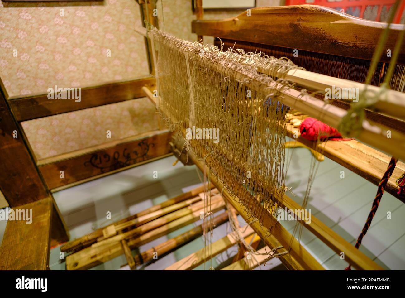 Old wooden loom. A loom made in the 19th century. The interior of a ...