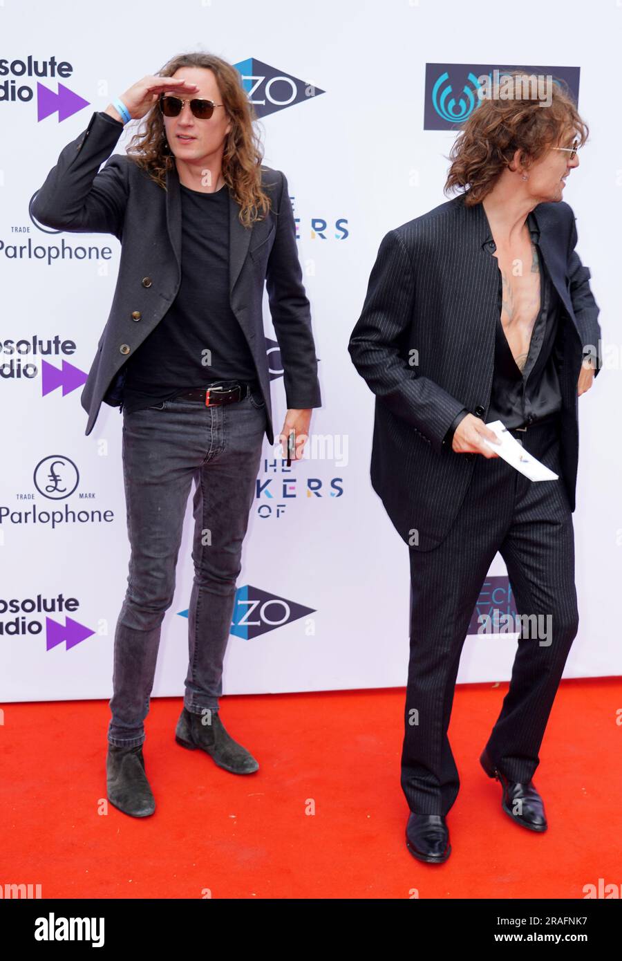 Dan Hawkins (left) and Justin Hawkins attend the premiere of the newly ...