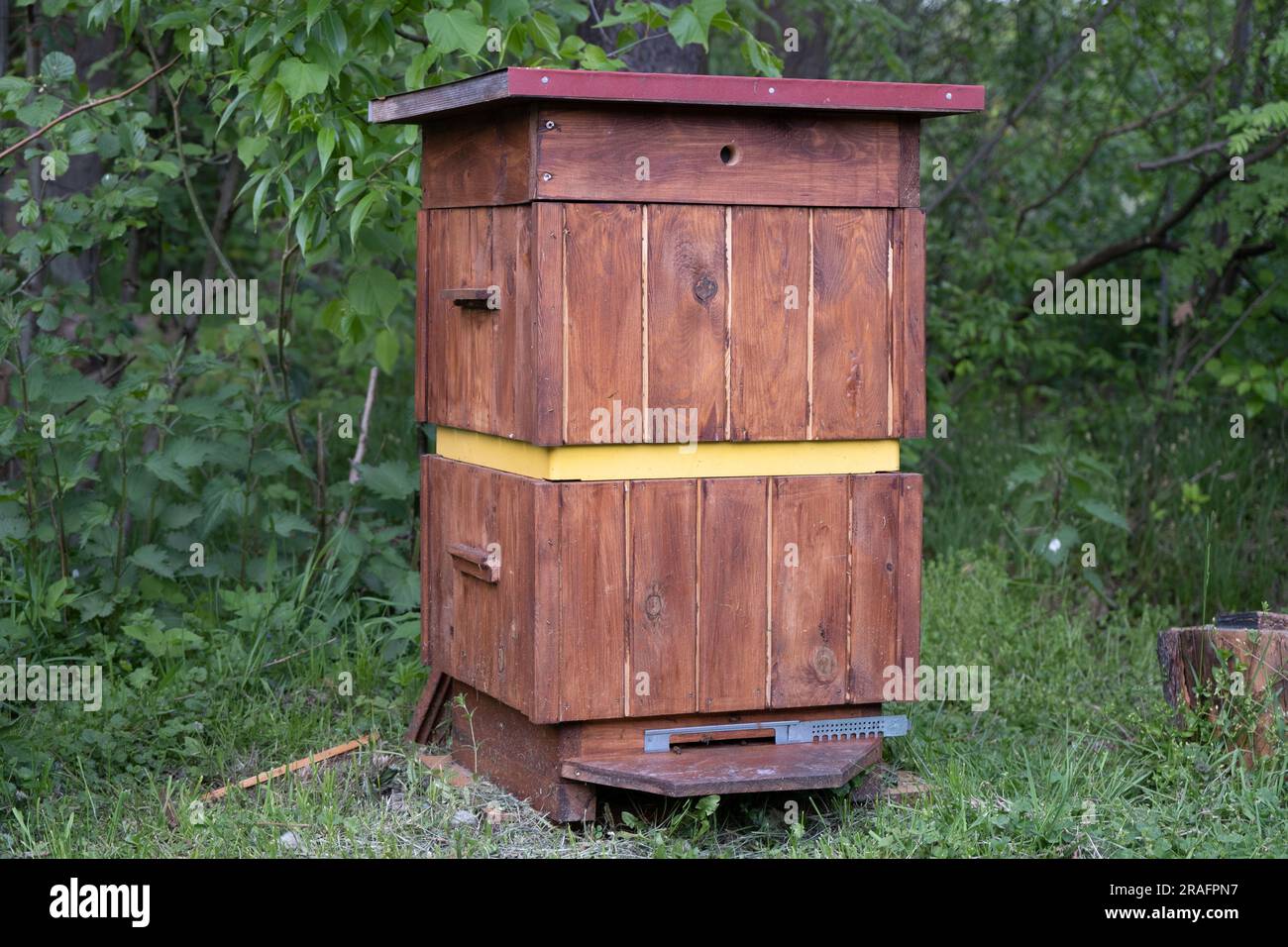 Colorful homemade bee hives - old construction Stock Photo - Alamy