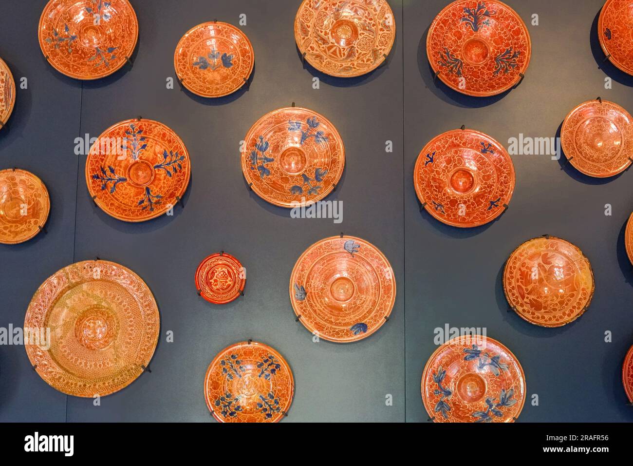 Ceramic plates from 15th century Valencia Spain decorate the walls at ...