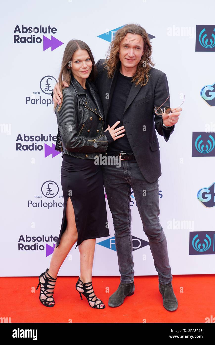 Dan Hawkins (right) and guest attend the premiere of the newly restored ...