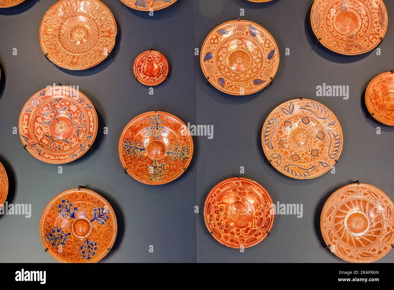 Ceramic plates from 15th century Valencia Spain decorate the walls at ...