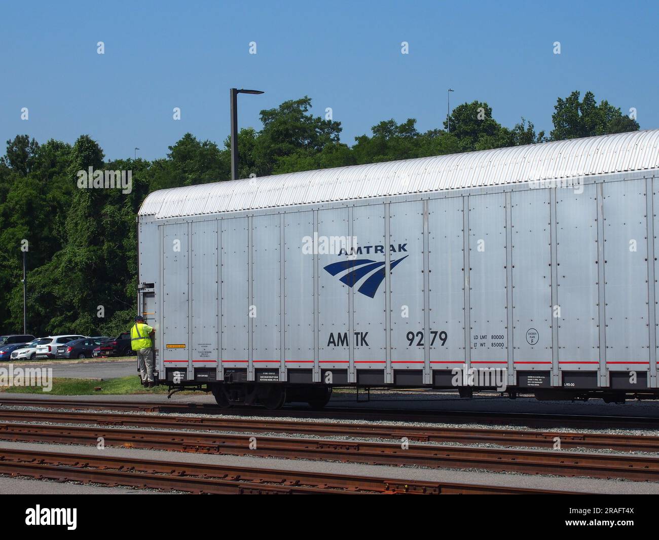 Amtrak Auto-Train car containing automobiles being positioned upon ...