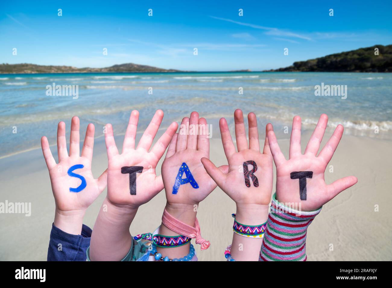 Children Hands Building Word Start, Ocean And Sea Stock Photo - Alamy