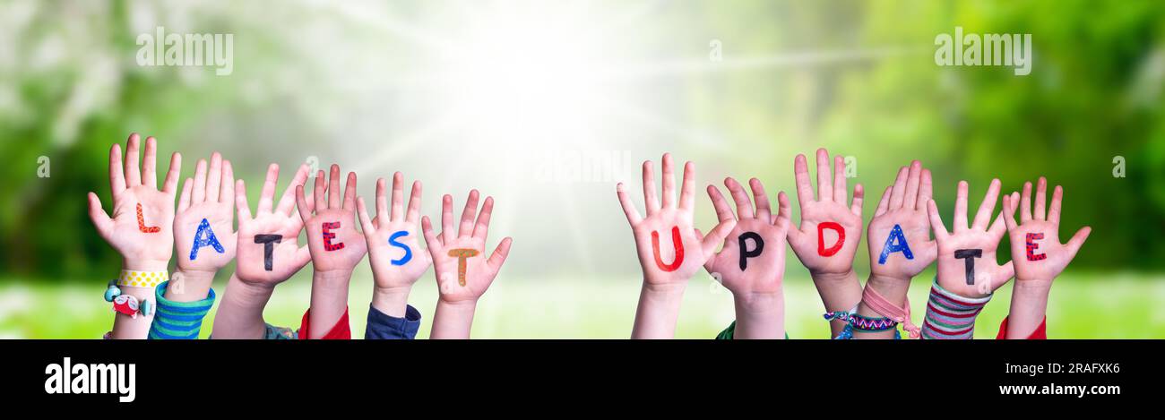 Children Hands Building Word Latest Update, Grass Meadow Stock Photo ...
