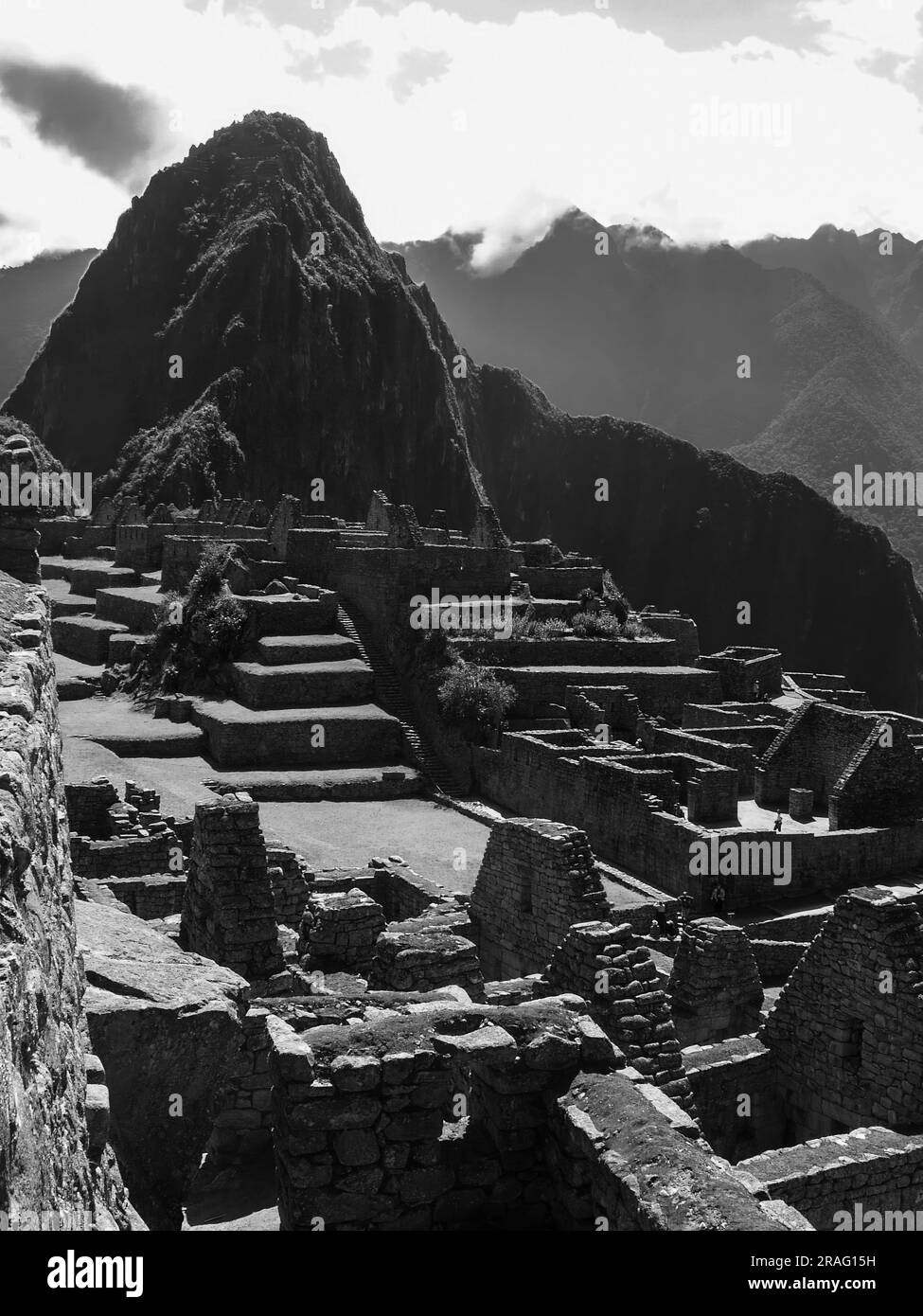 Machu Picchu in Peru on a clear sunny day, with Inca buildings and ...