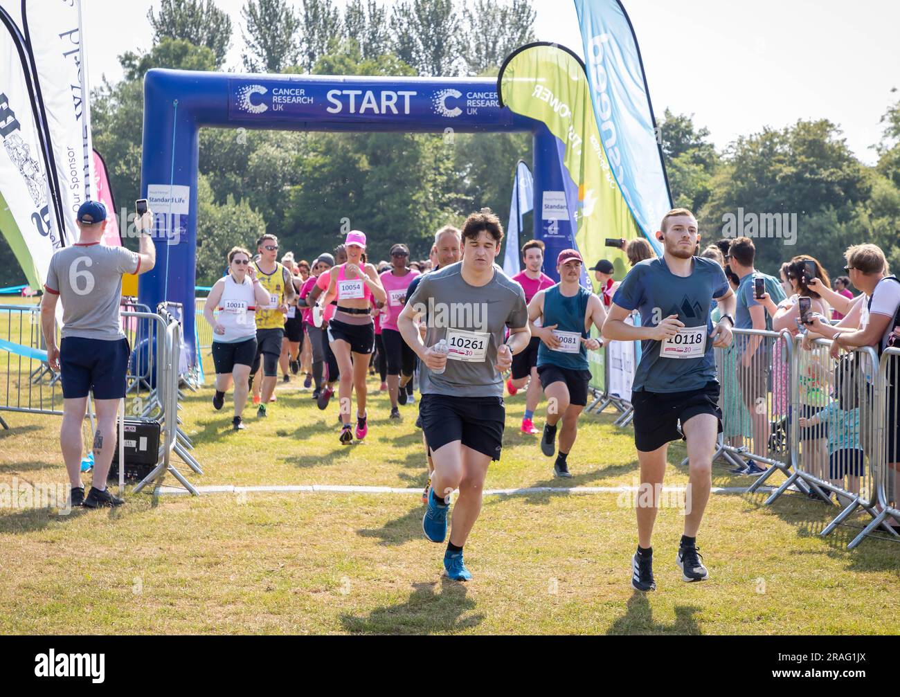 Race for Life in aid of Cancer Research. Hundreds of people dressed in ...